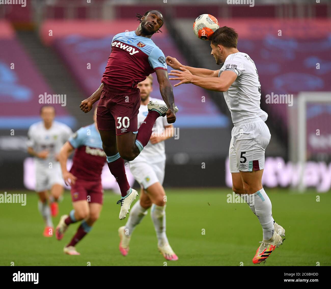 West Ham United's Michail Antonio (left) and Burnley's James Tarkowski ...