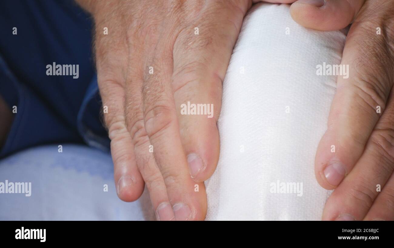 Doctor Apply a New and Clean Bandage on a Foot Wound in Hospital ...