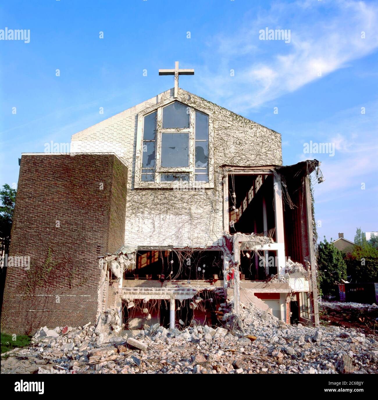 Church being demolished. Part of the interior is visible. Lots of ...