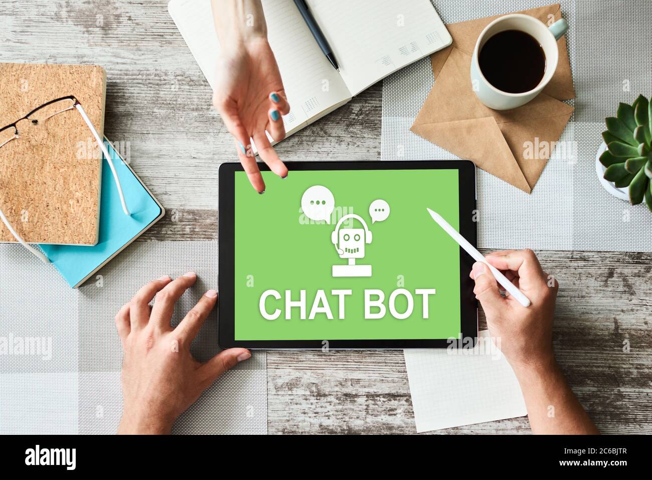 Chatbot icon on device screen. Customer Support automation concept ...