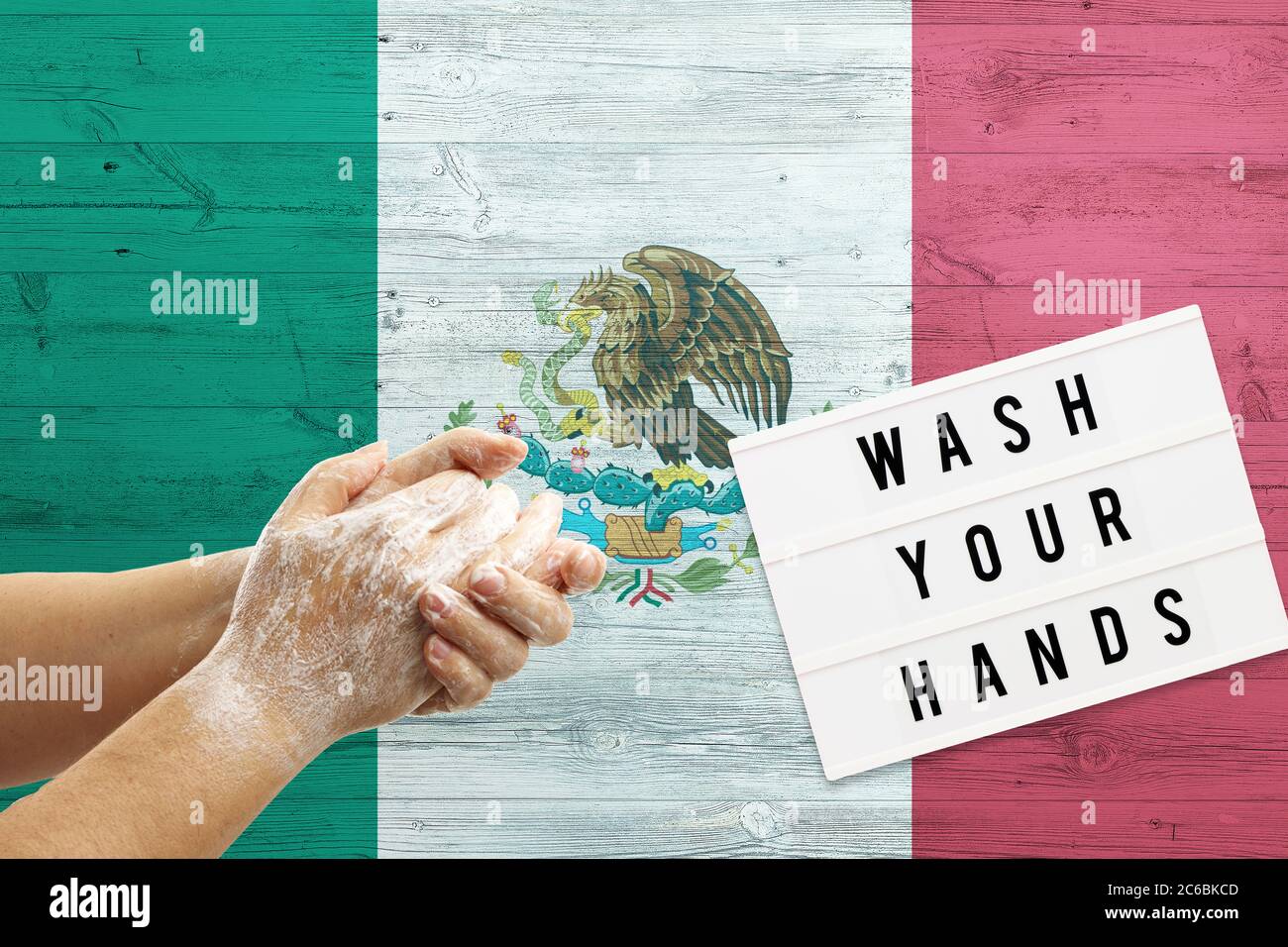 Mexico flag background on wooden surface. Minimal wash your hands board ...