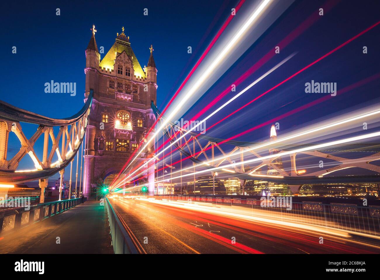 London Tower Bridge with Moving Bus Light Trails at Night, UK Stock ...
