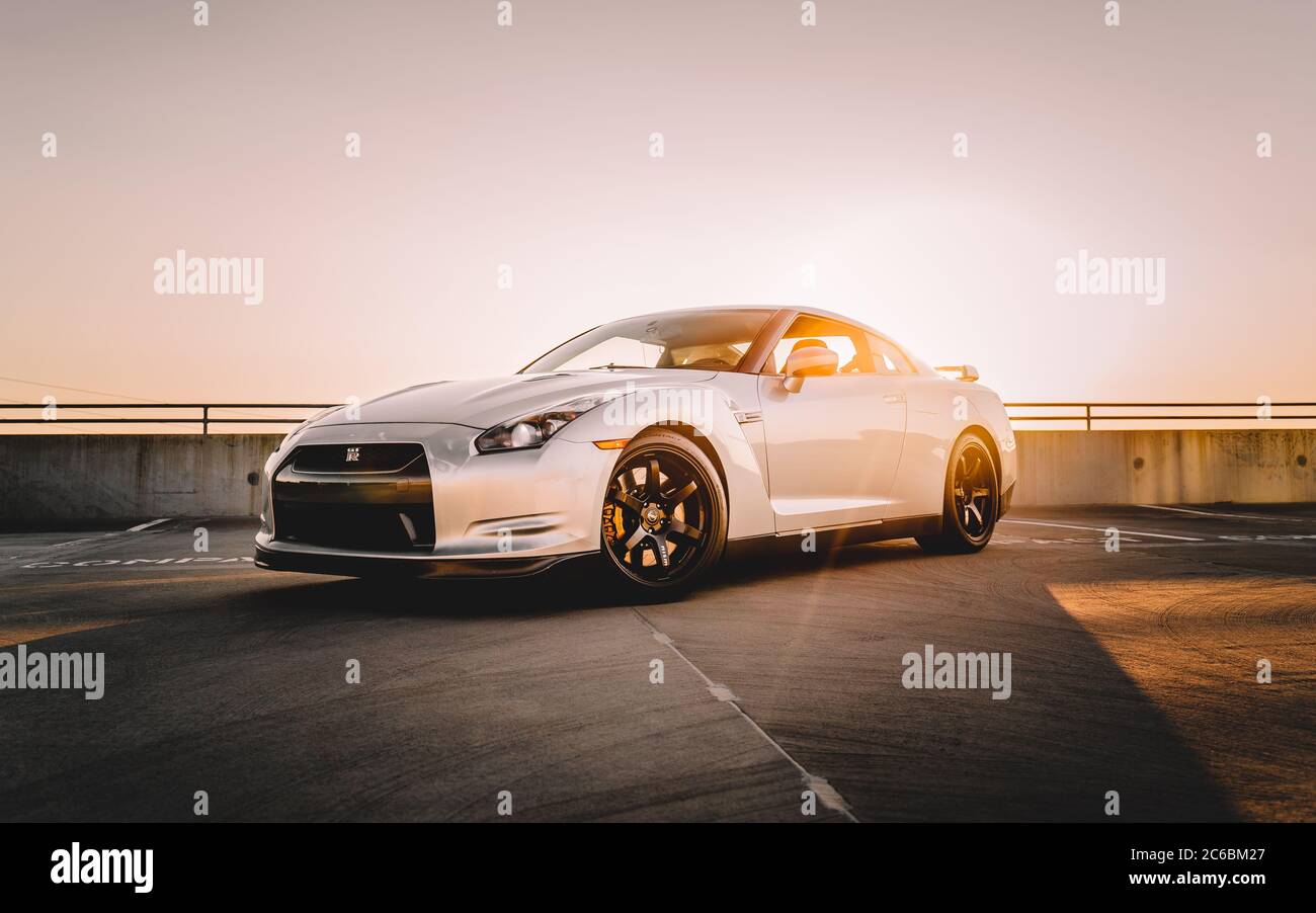 Nissan GTR in silver during sunset Stock Photo - Alamy