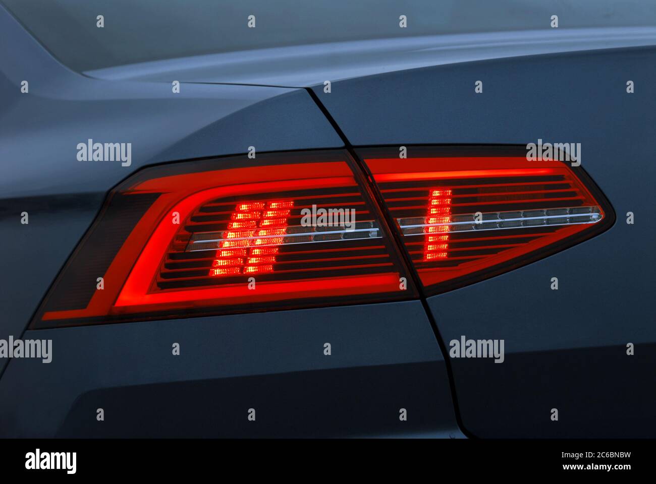 Rear car light, activated rear lamp on a modern luxury car Stock Photo ...
