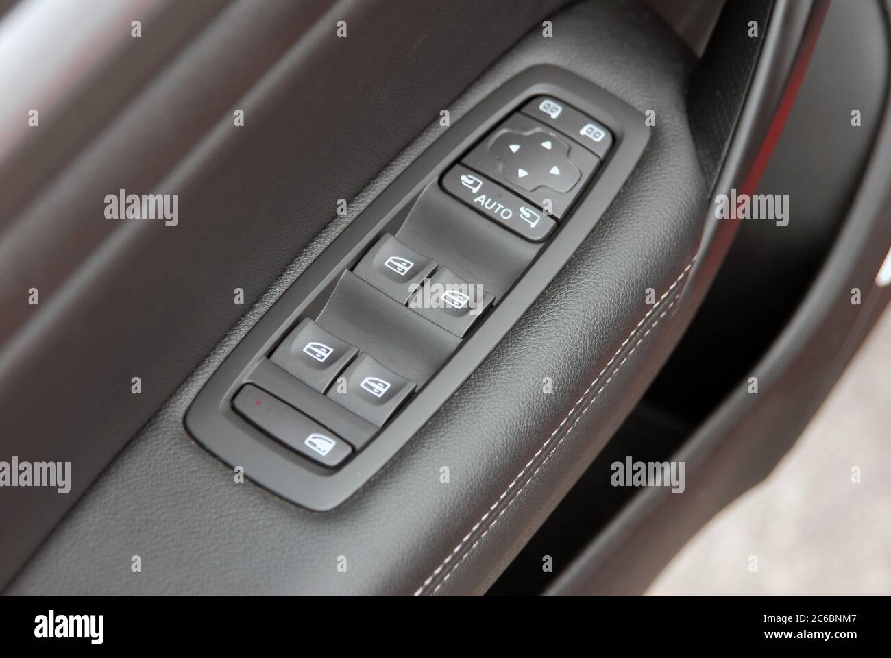 side mirror switch control and window button, car interior detail Stock ...