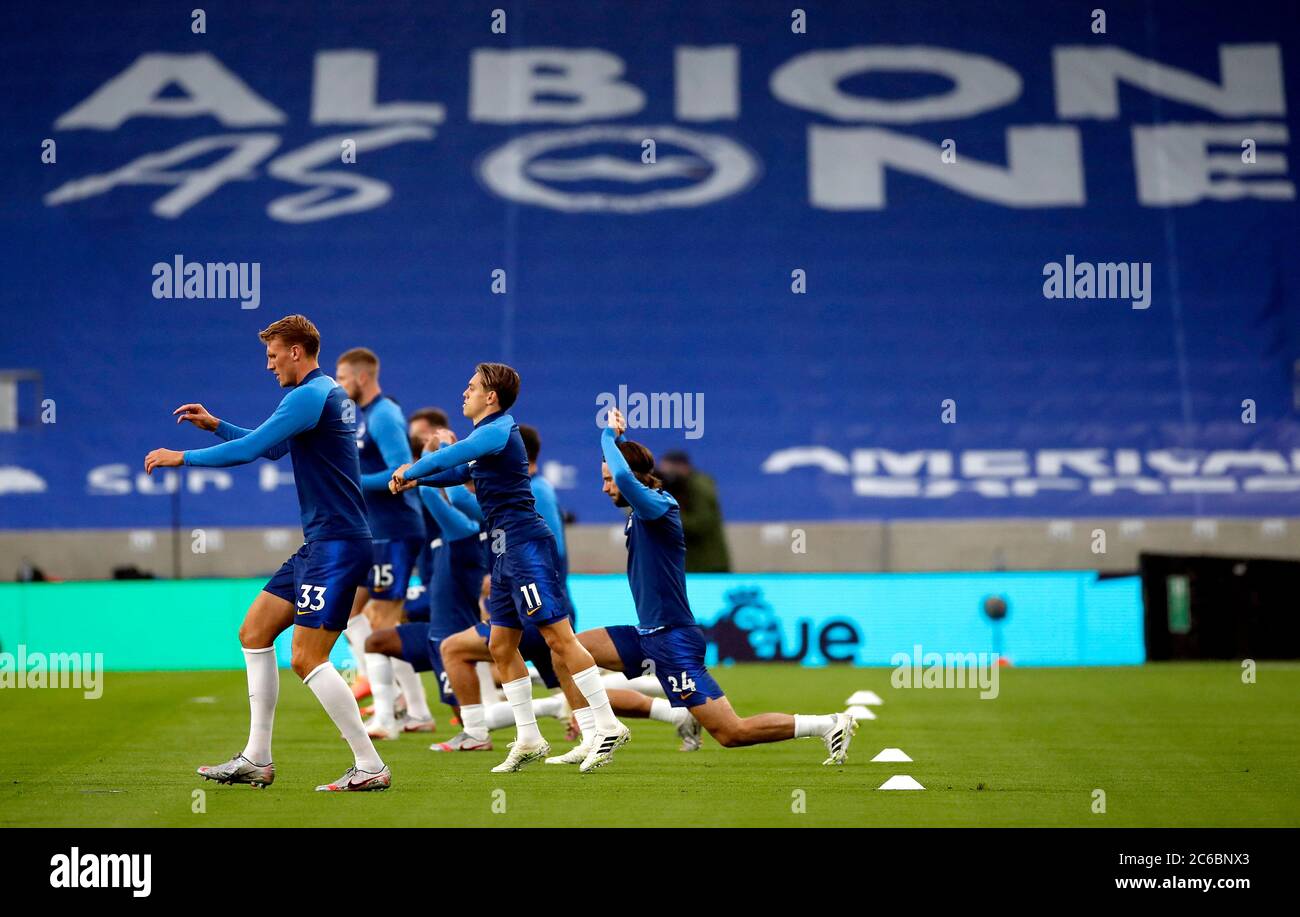 Brighton and Hove Albion warm up on the pitch before the Premier League ...