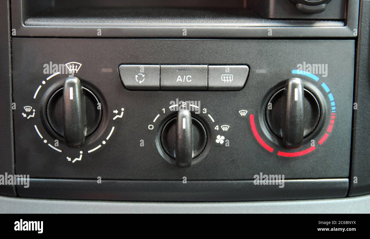 manual switches the air conditioning on the dashboard of the car Stock ...