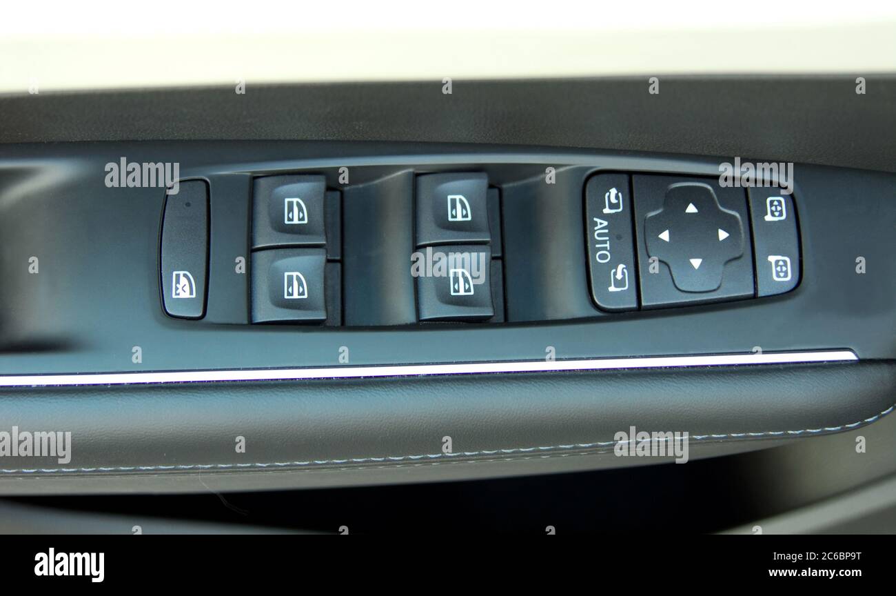 side mirror switch control and window button, car interior detail Stock ...