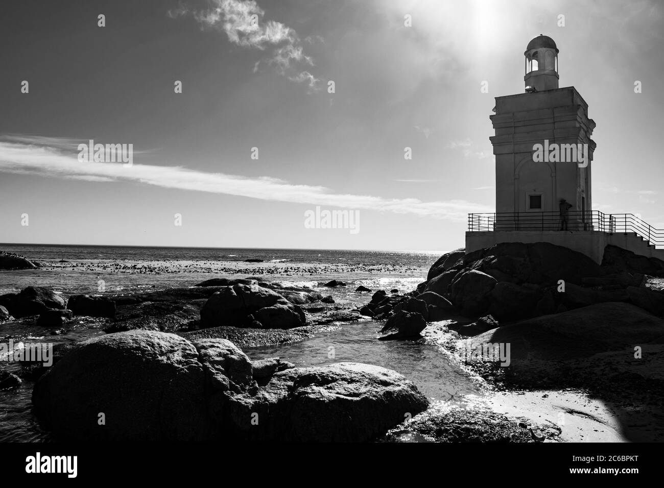 Lighthouse on rocks light Black and White Stock Photos & Images - Alamy