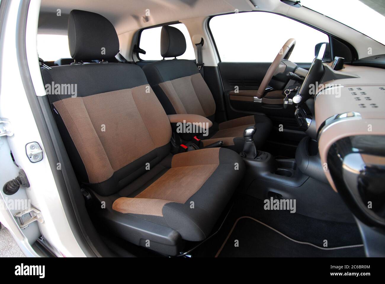 Front car seats. Front seats of a modern passenger car Stock Photo - Alamy