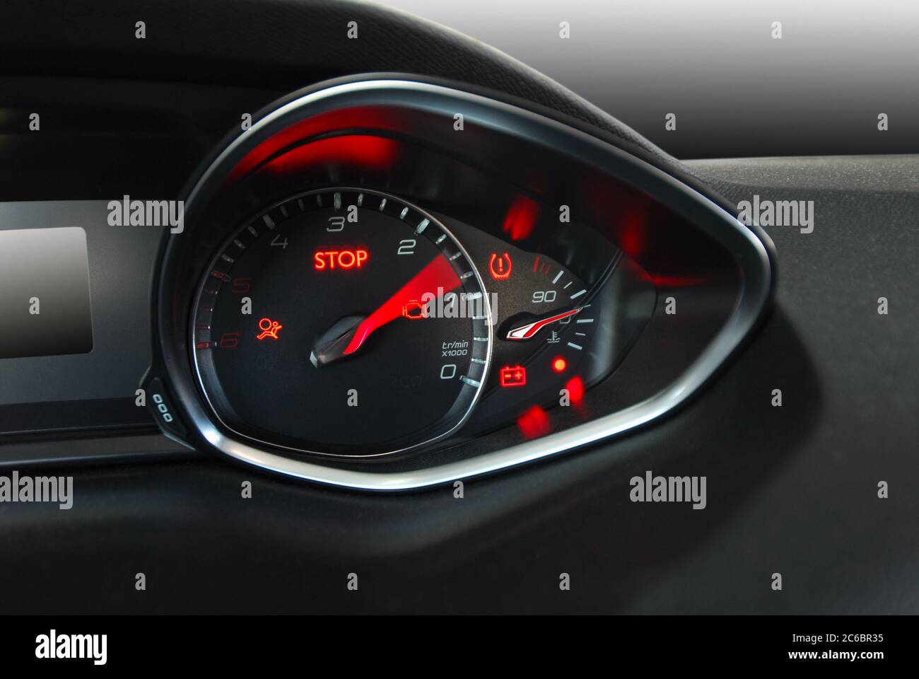 Car Tachometer. A passenger car tachometer on the instrument panel. Car ...