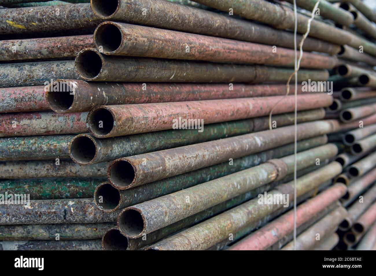 Scaffolding stacked with a stack for storage. Equipment for high ...