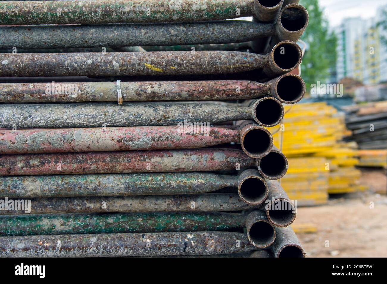Scaffolding stacked with a stack for storage. Equipment for high ...