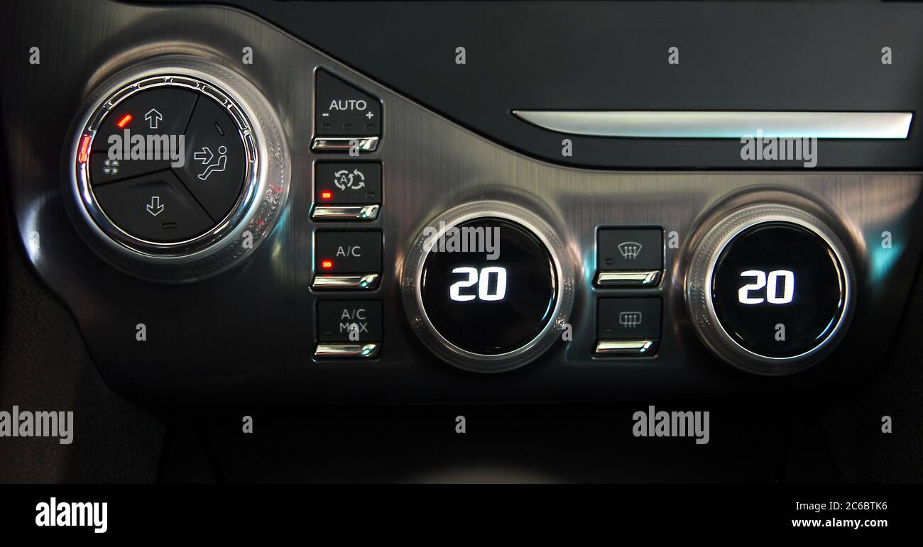 Manual switches the air conditioning on the dashboard of the car Stock ...