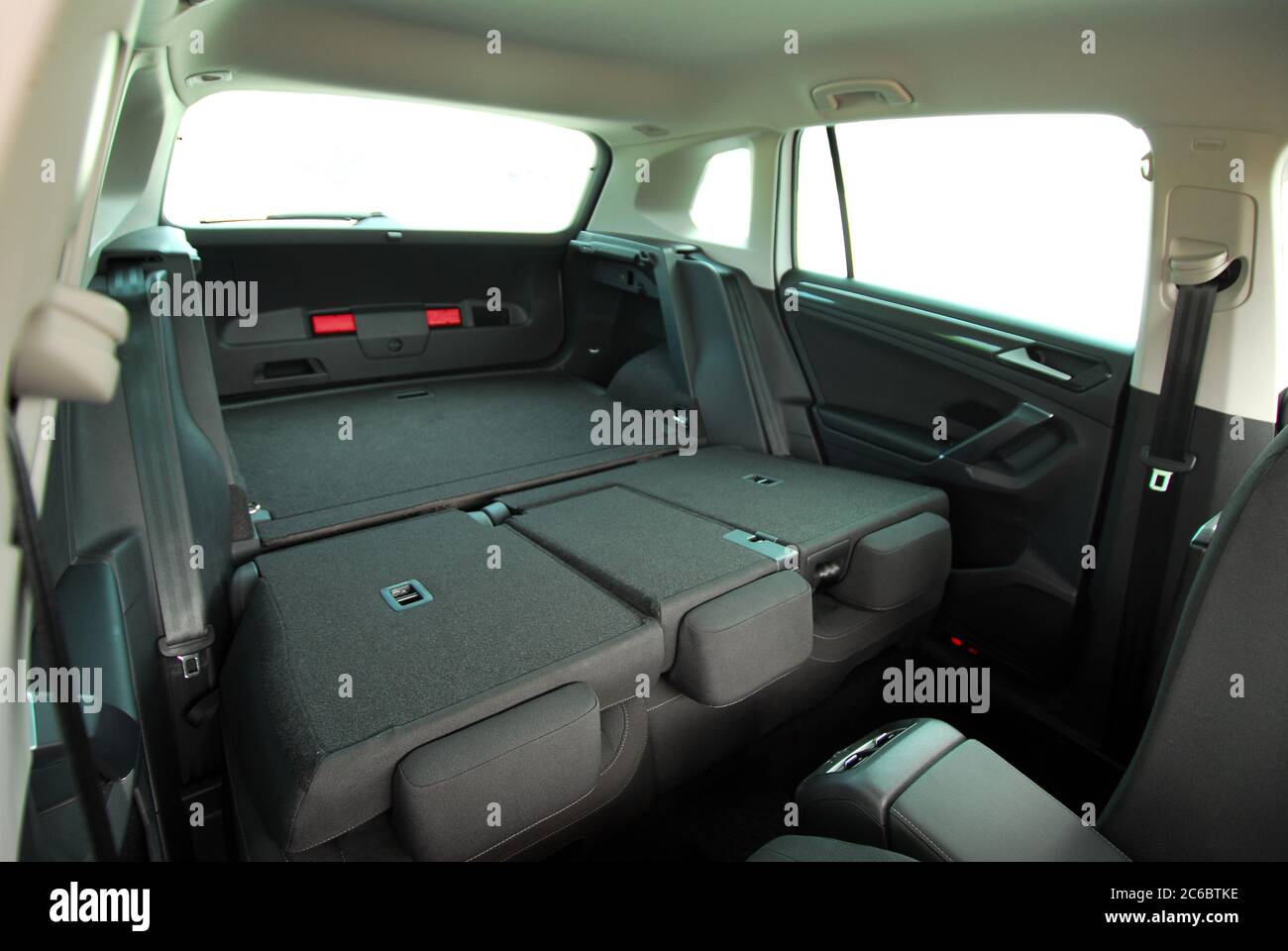 Car trunk from inside. Car trunk with rear seats folded Stock Photo - Alamy