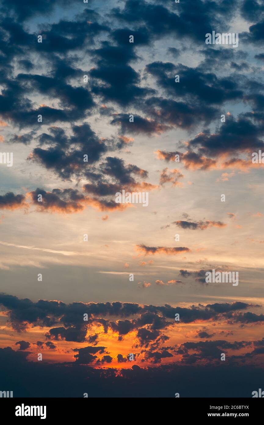 Beautiful sunrise sky with dramatic light texture background vertical ...
