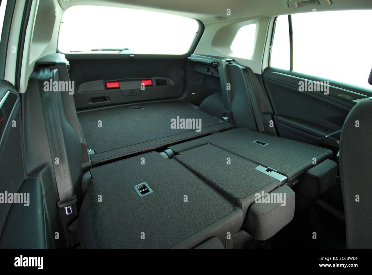 Car trunk from inside. Car trunk with rear seats folded Stock Photo - Alamy