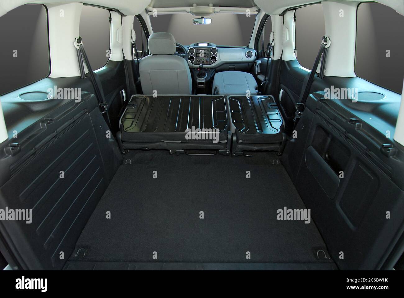 Car trunk. Car trunk with rear seats folded Stock Photo - Alamy