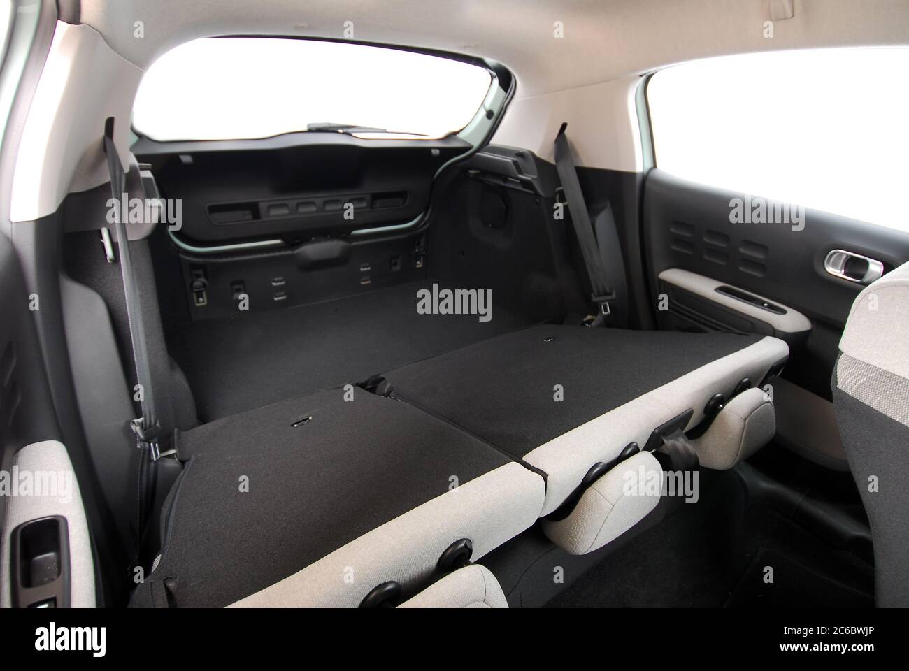 Car trunk. Car trunk with rear seats folded inside view Stock Photo - Alamy