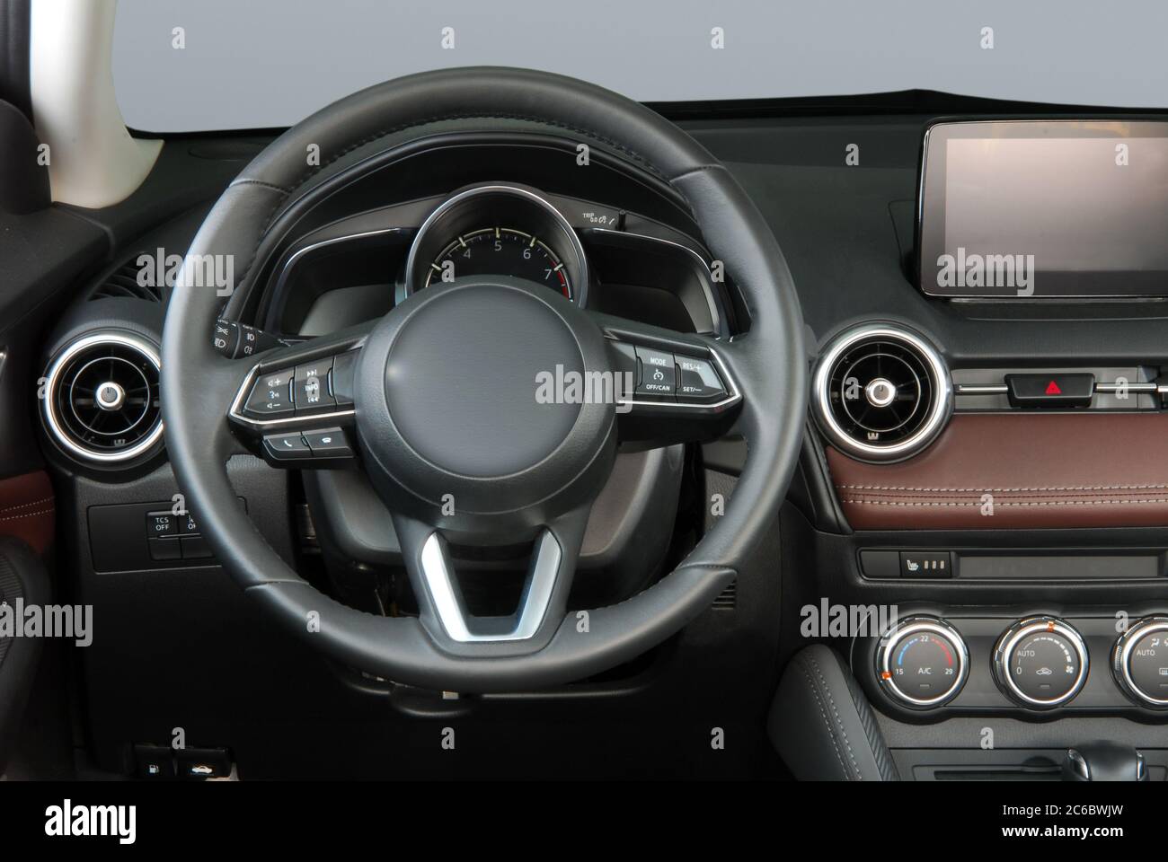 Steering wheel in the new modern car Stock Photo - Alamy