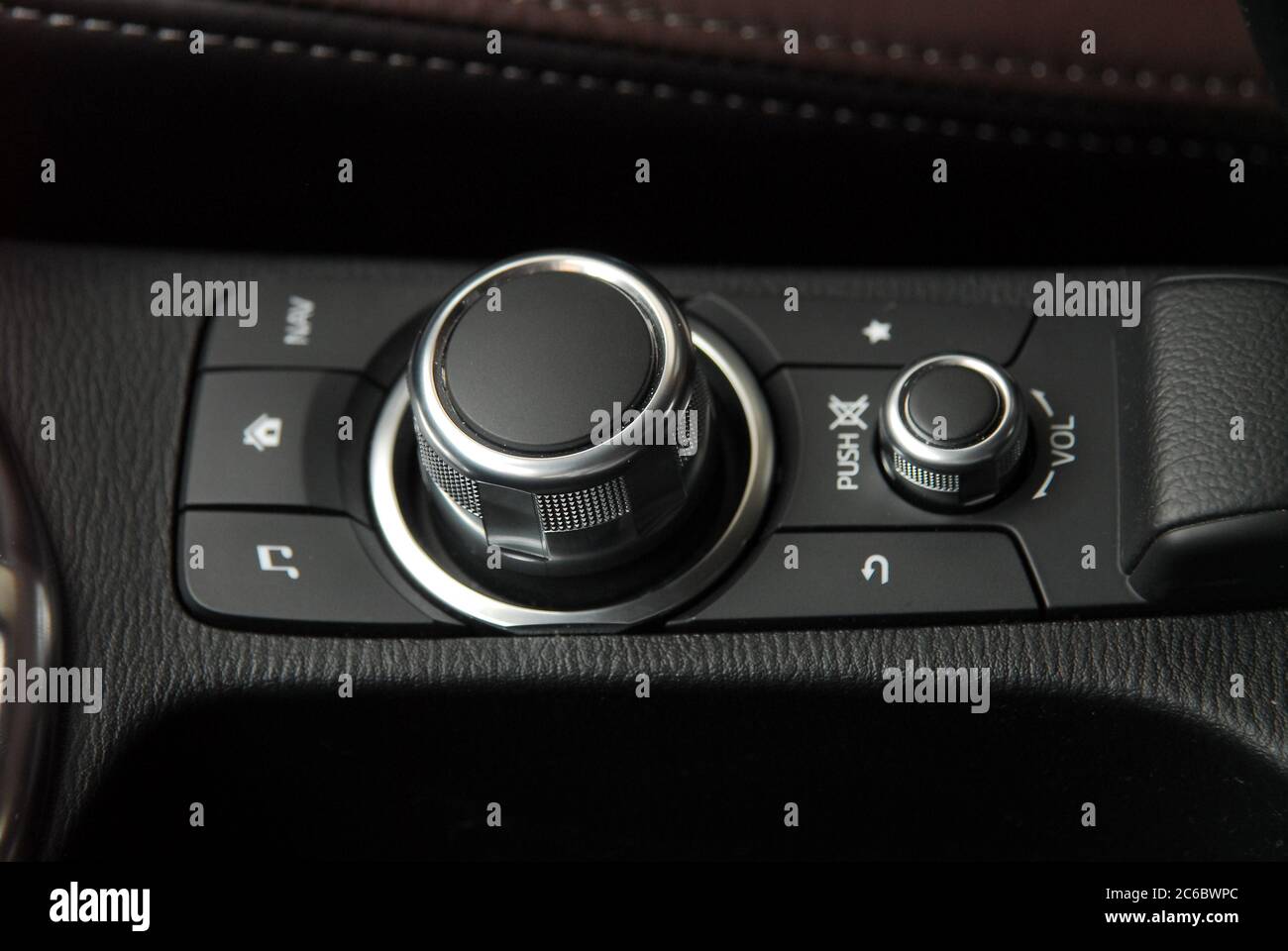 Car panel buttons. Close-up of black buttons on car panel. Panel with ...