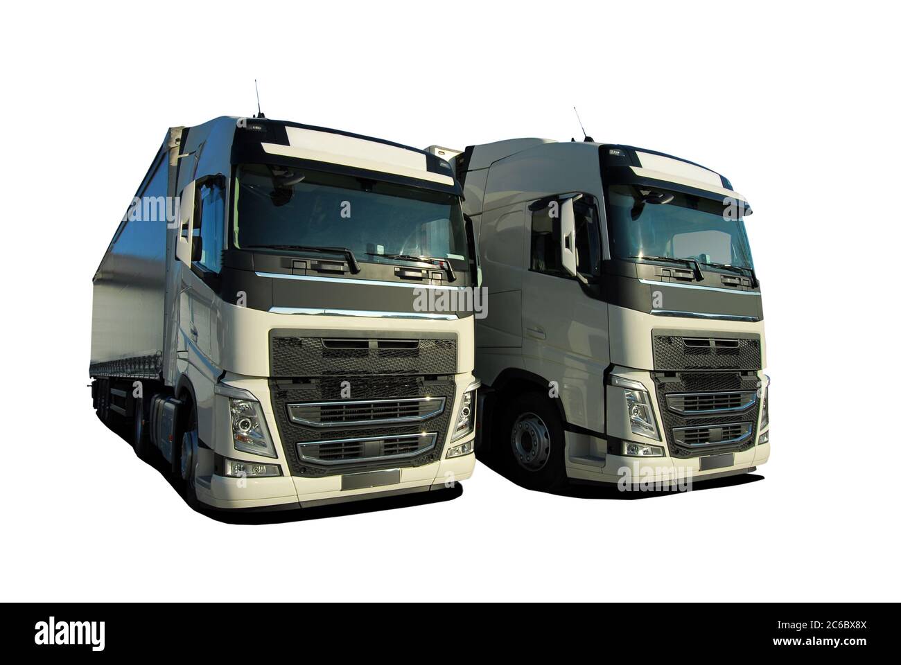 Two trucks. Two large trucks with semi trailer on a white background ...