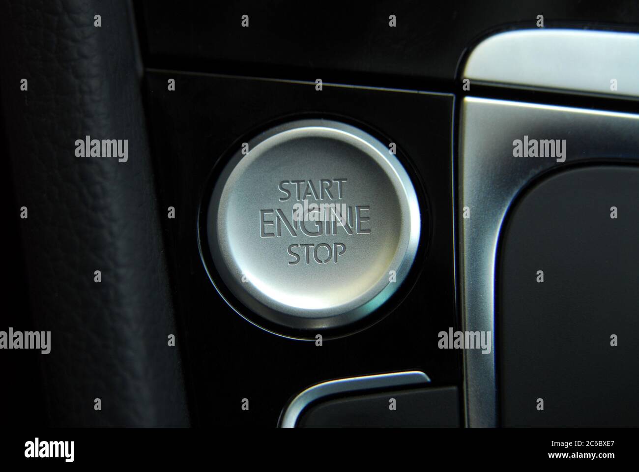 Start engine button. Start stop engine button on a modern car dashboard ...