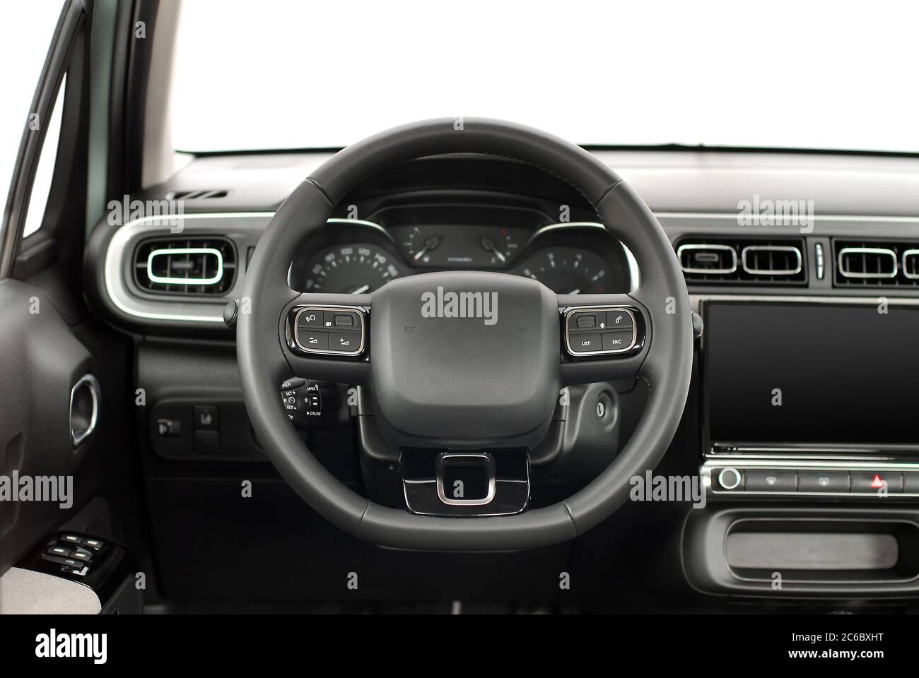 Steering wheel in the new modern car Stock Photo - Alamy
