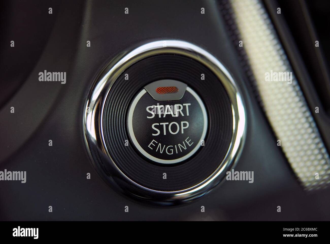 Start engine button. Start stop engine button on a modern car dashboard ...
