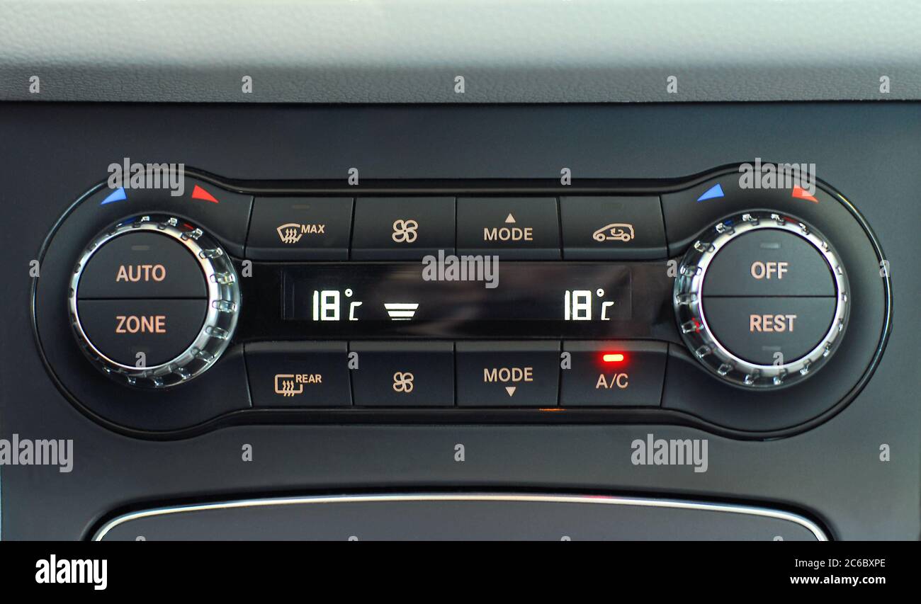 manual switches the air conditioning on the dashboard of the car Stock ...