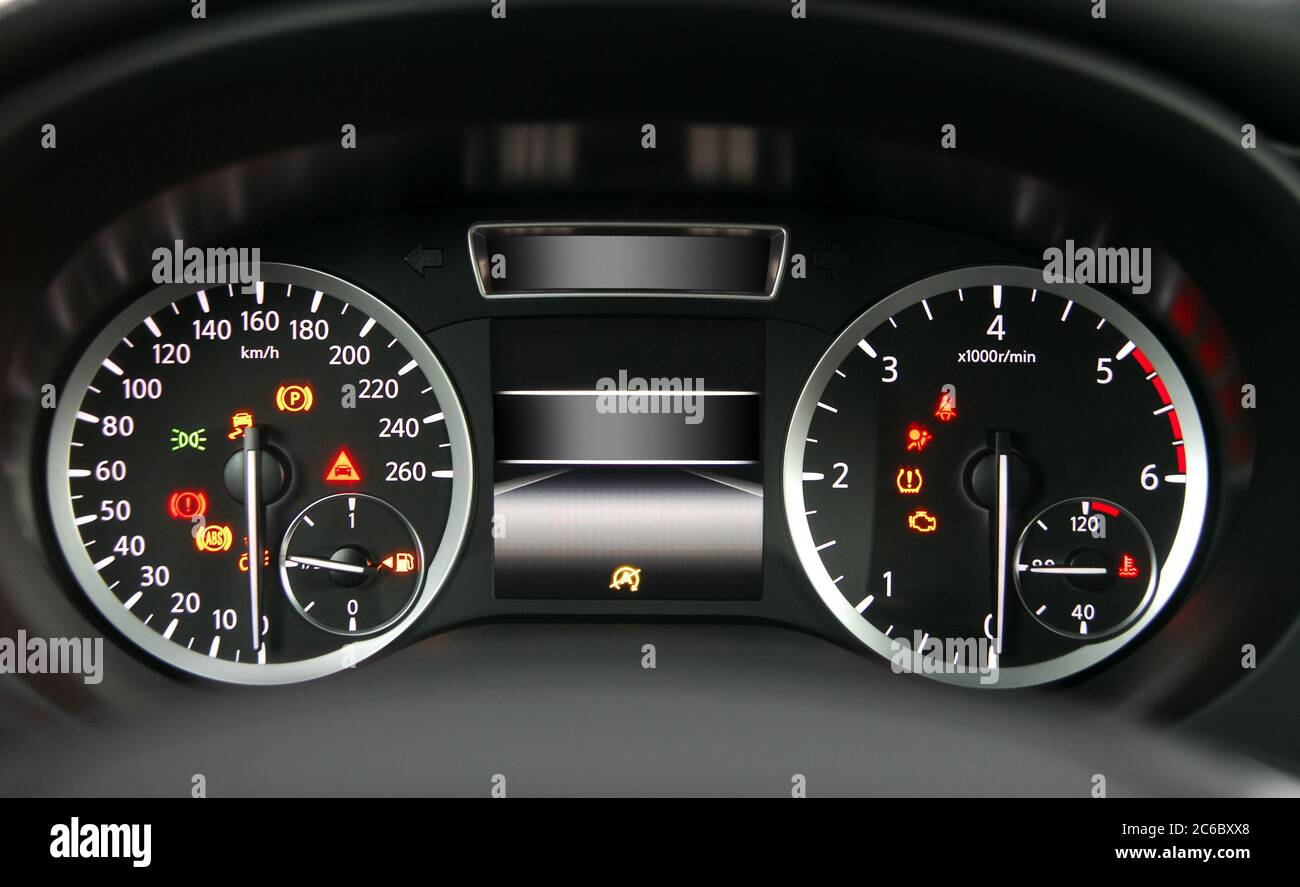 Car illuminated dashboard. Modern car illuminated dashboard closeup ...