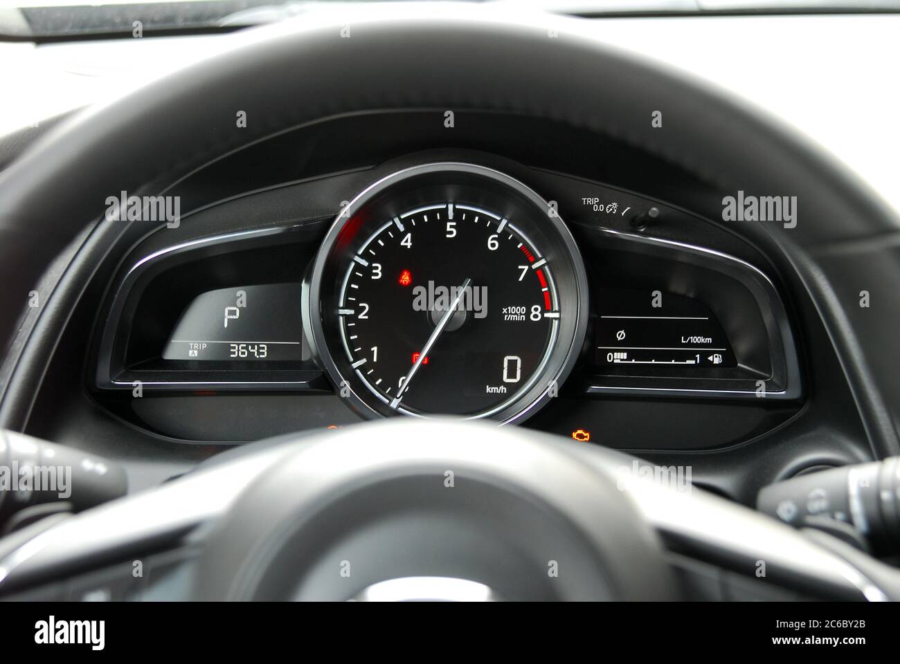 Car illuminated dashboard. Modern car illuminated dashboard closeup ...