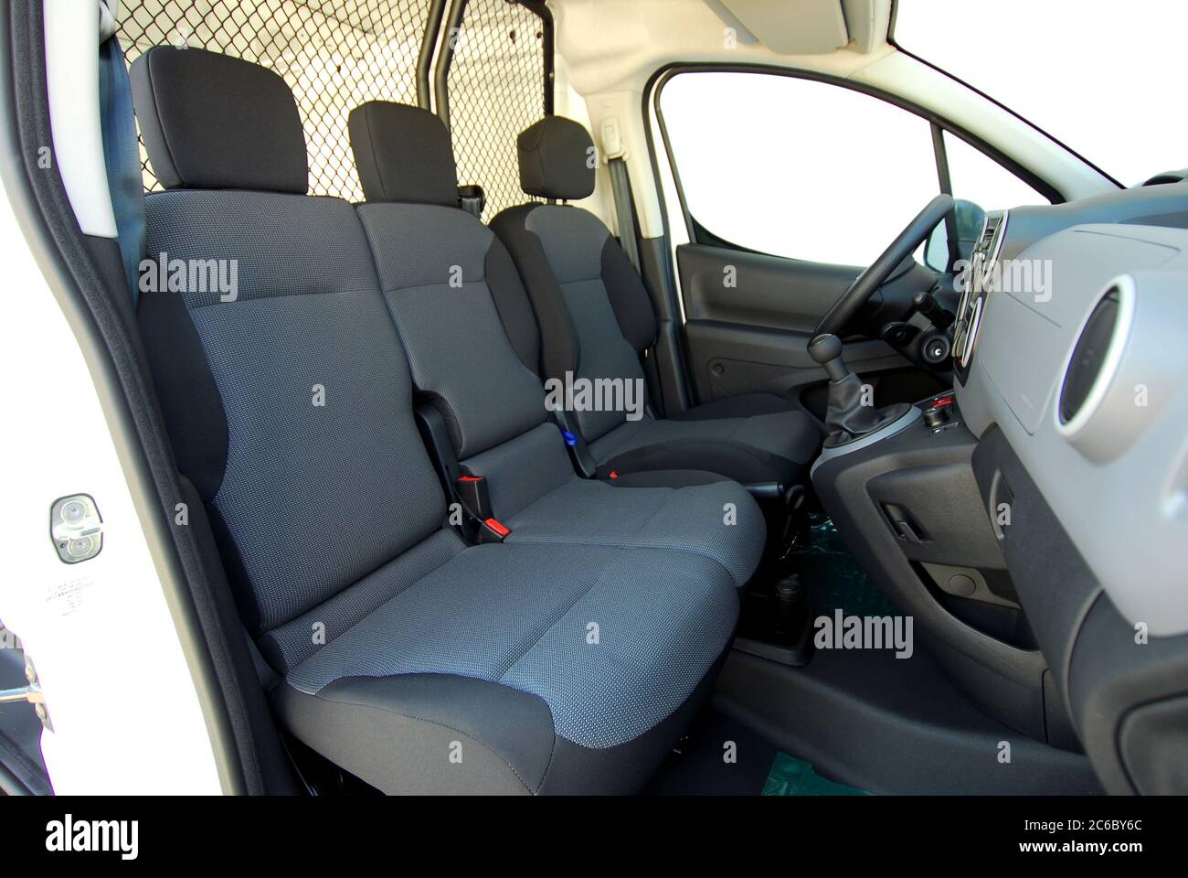 The inside of the car, front view. Front seats of a modern delivery car ...
