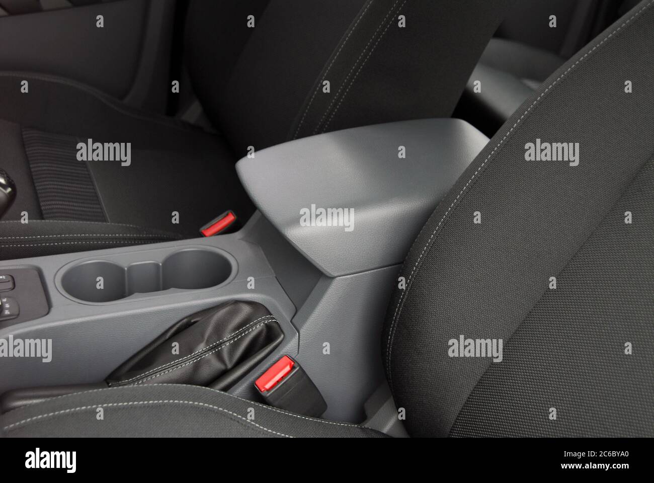 armrest in the luxury passenger car between front seats Stock Photo - Alamy