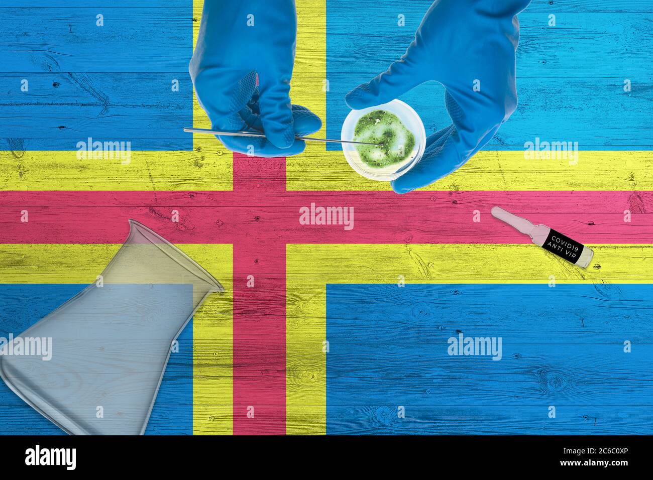 Aland Islands flag on laboratory table. Medical healthcare technologist ...