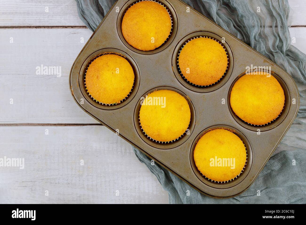 Vanilla homemade cupcakes in baking tray. Top view Stock Photo - Alamy