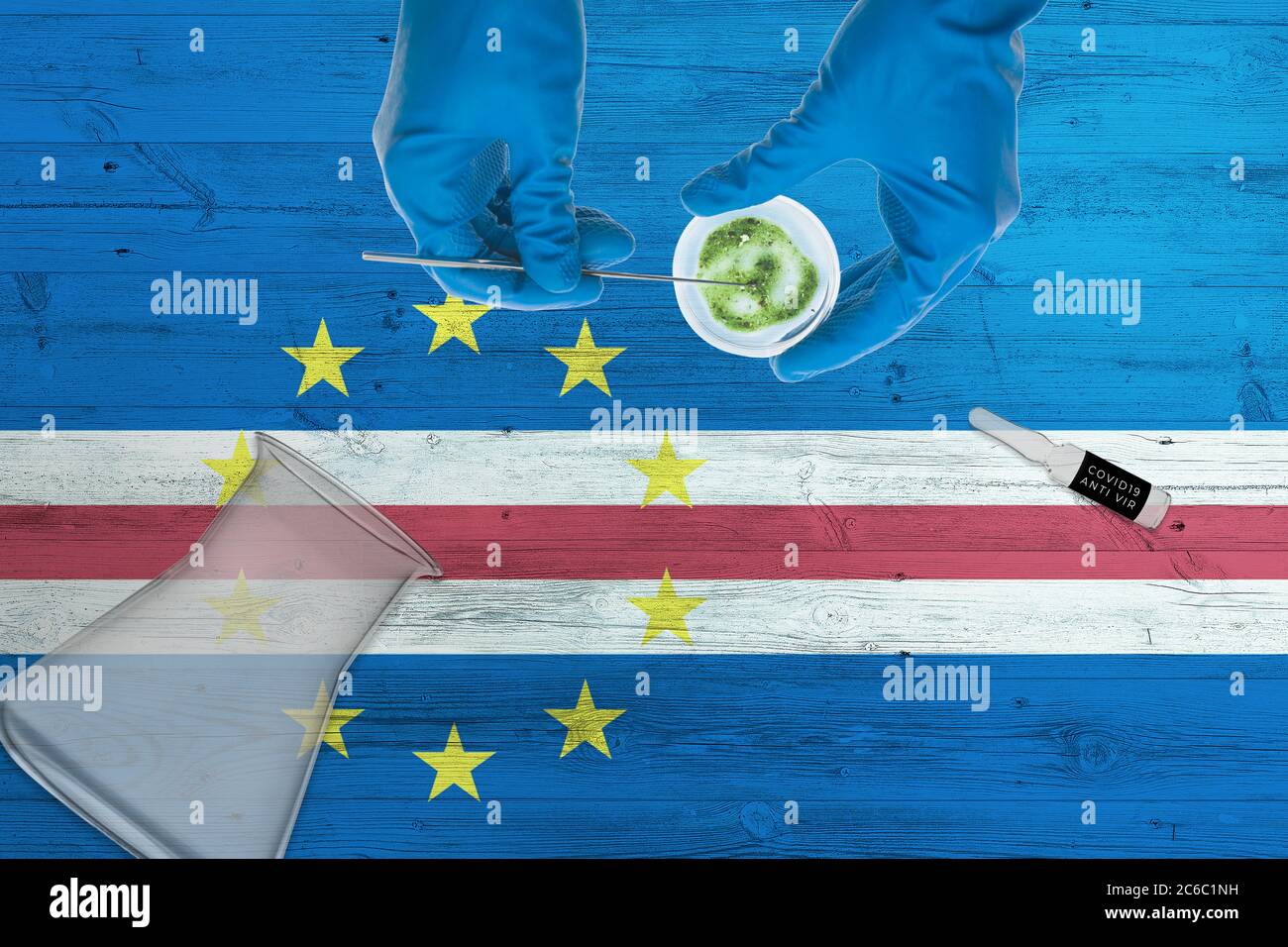 Cape Verde flag on laboratory table. Medical healthcare technologist ...