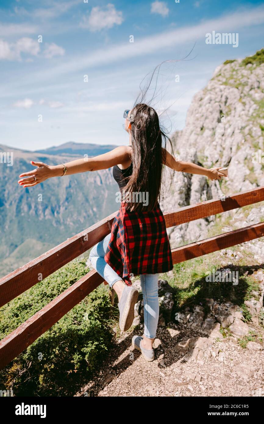 pretty woman relax in mountains with wind in hair Stock Photo - Alamy