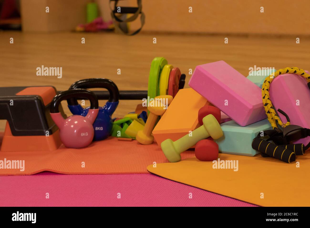 Set composition of various bright sports equipment. Kettlebells ...