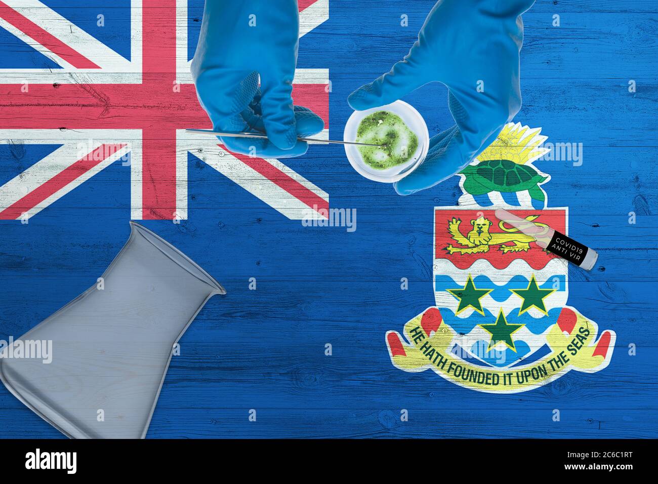 Cayman Islands flag on laboratory table. Medical healthcare ...