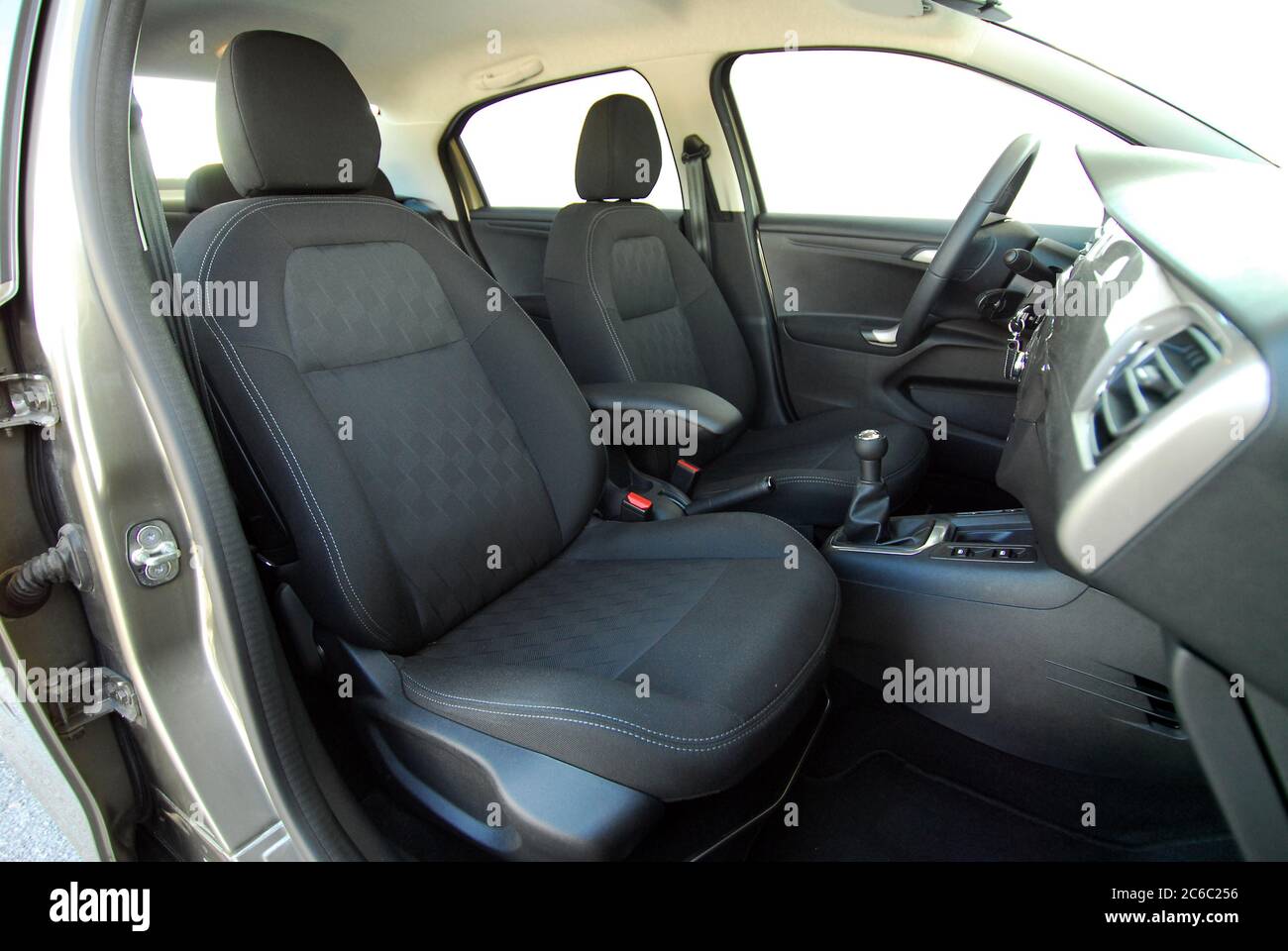 Front car seats. Front seats of a modern passenger car Stock Photo - Alamy