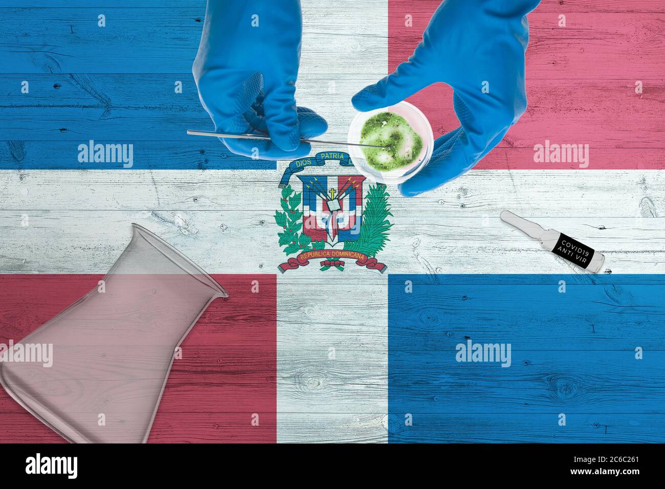 Dominican Republic flag on laboratory table. Medical healthcare ...