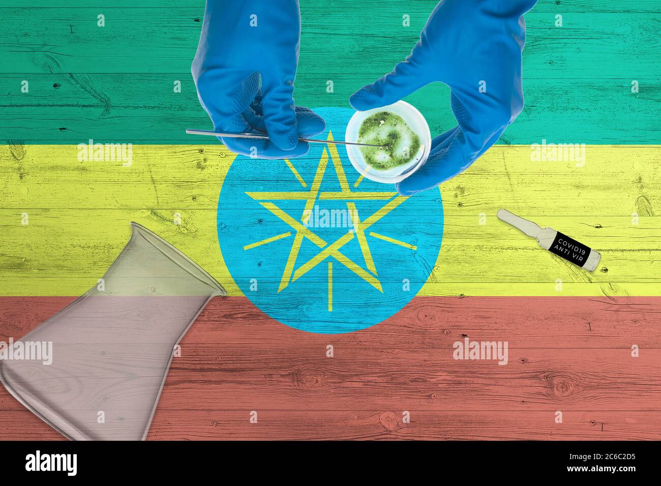 Ethiopia flag on laboratory table. Medical healthcare technologist ...
