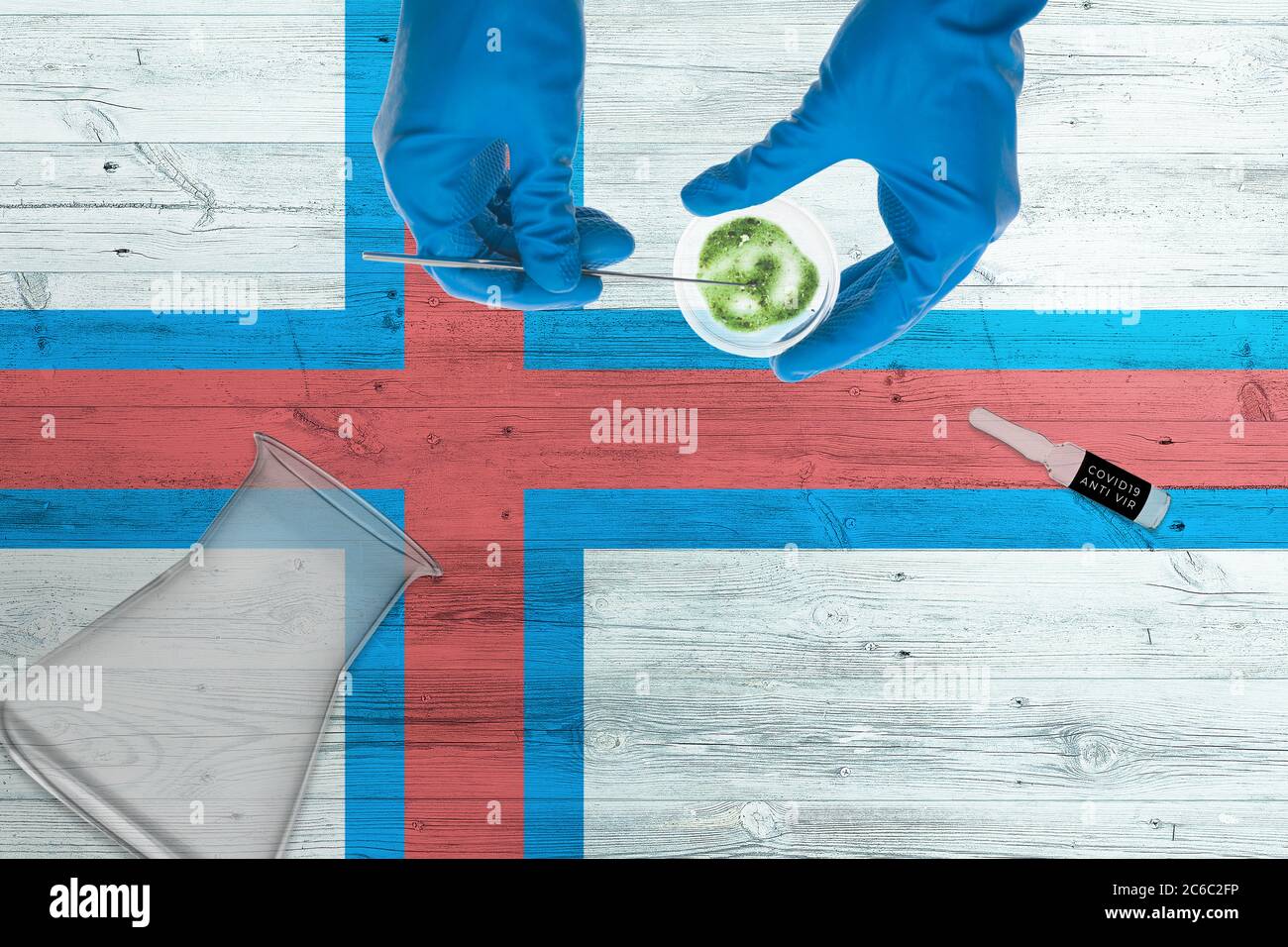 Faroe Islands flag on laboratory table. Medical healthcare technologist ...