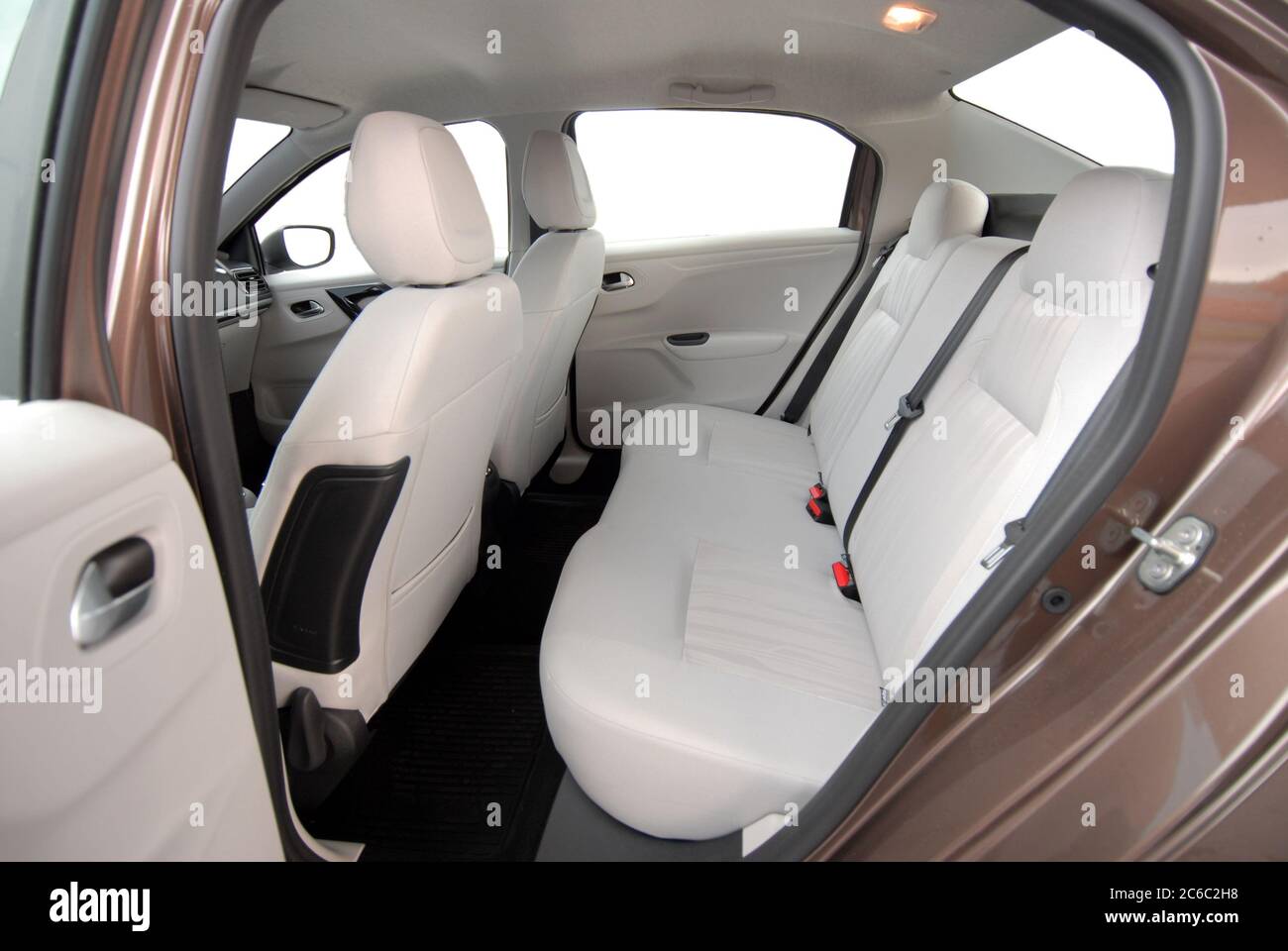 The white rear seat of a luxury passenger car Stock Photo - Alamy