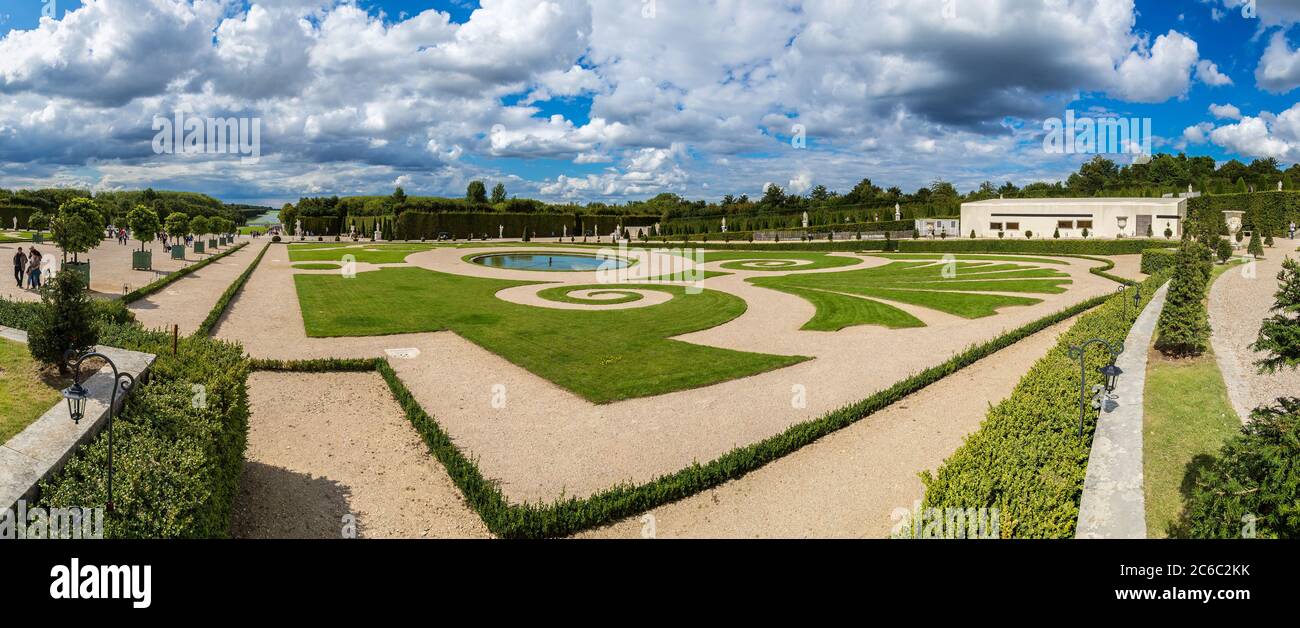 The Gardens of Versailles in a beautiful summer day in Paris, France ...
