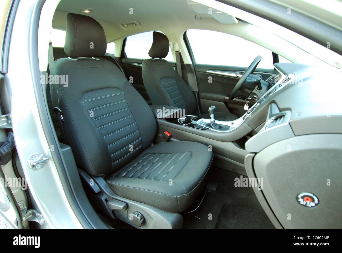 Front car seats. Front seats of a modern passenger car Stock Photo - Alamy