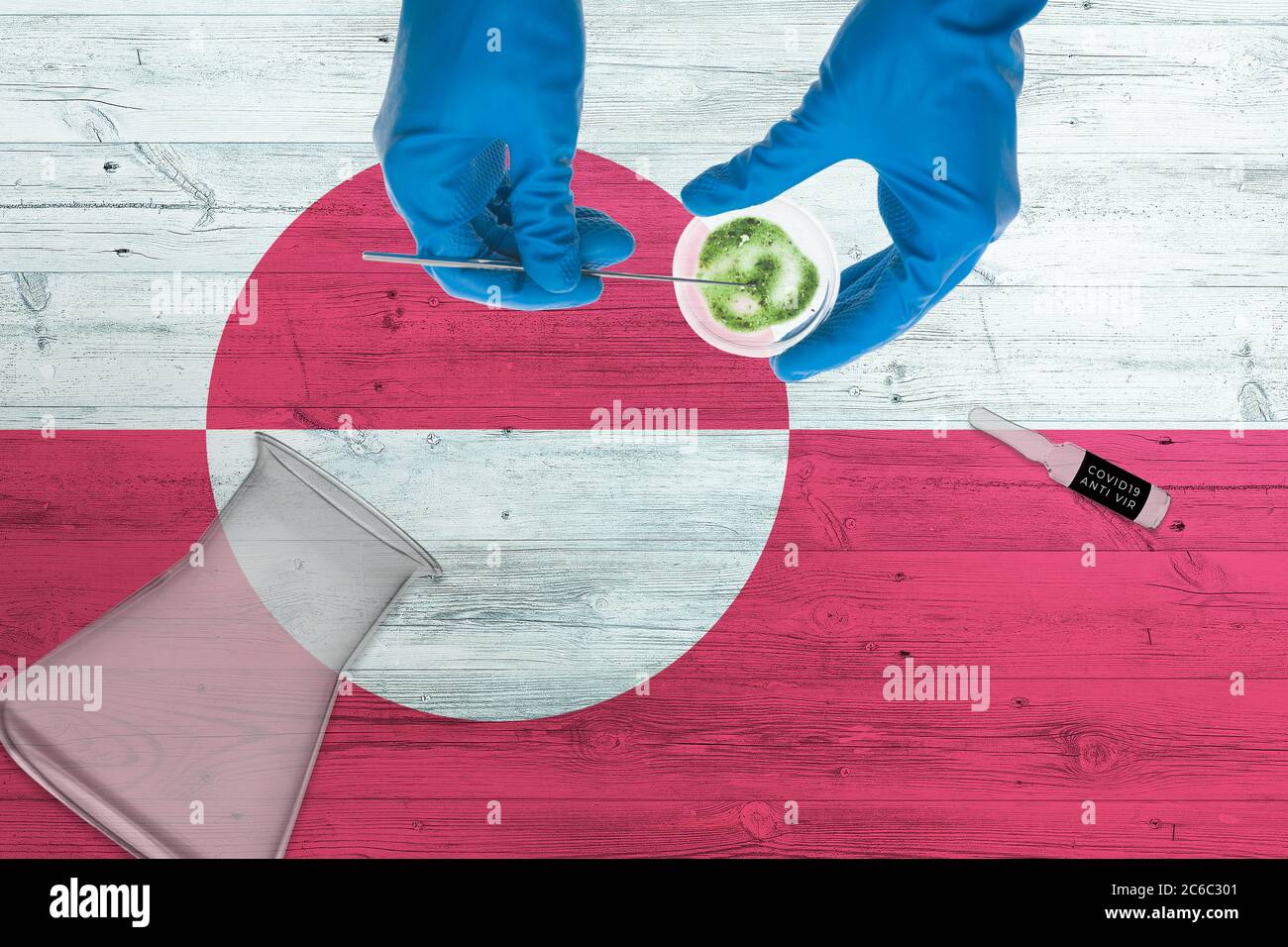 Greenland flag on laboratory table. Medical healthcare technologist ...
