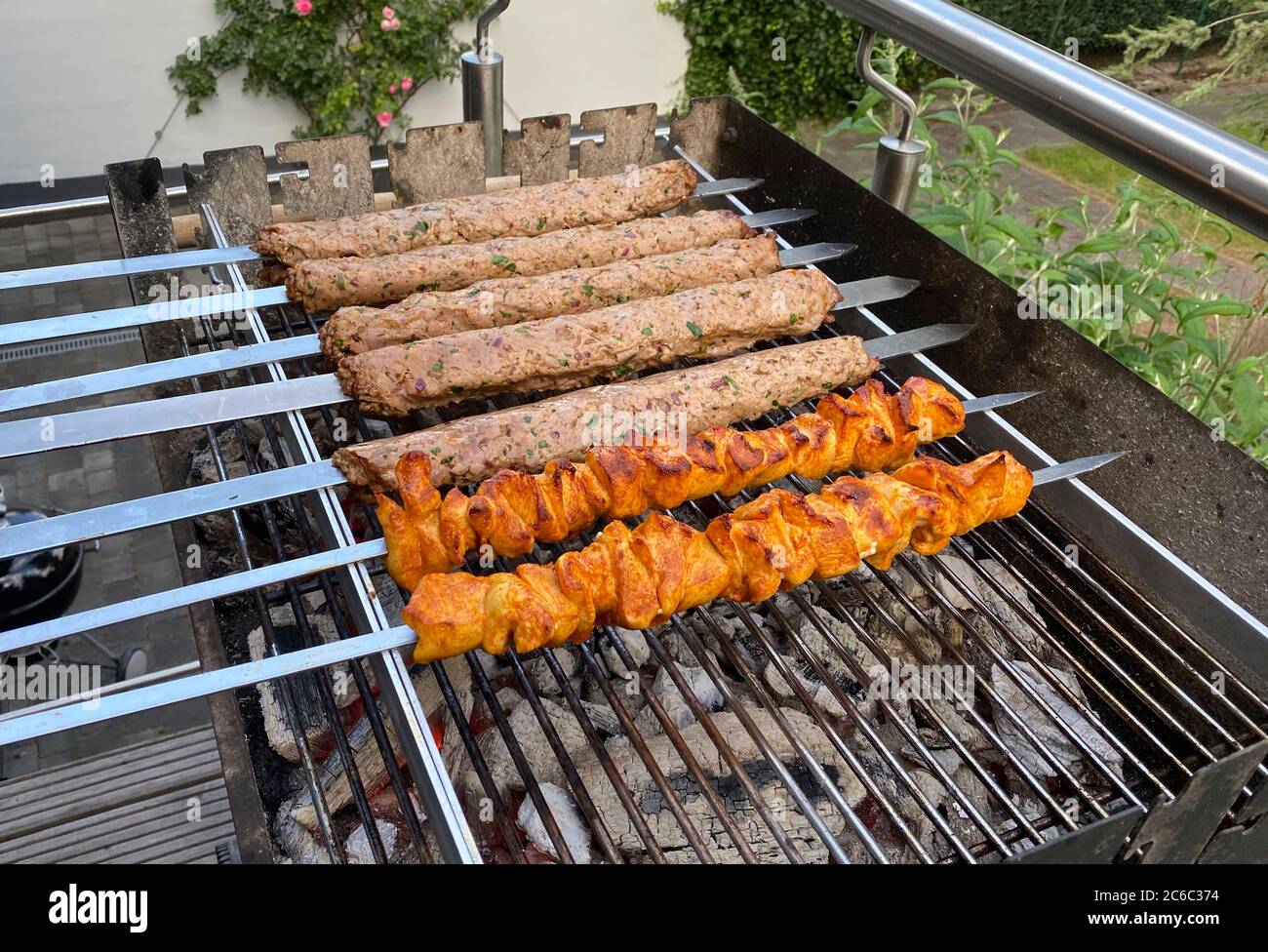 charcoal grill, with poultry skewers, lamb mince skewers Stock Photo ...