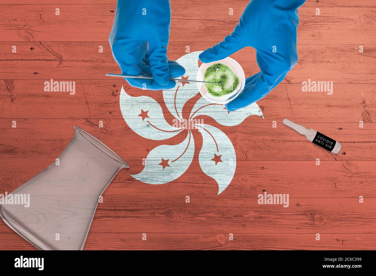 Hong Kong flag on laboratory table. Medical healthcare technologist ...